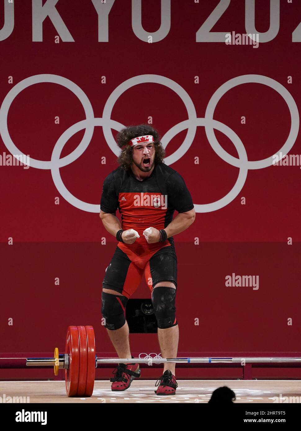 Canada's Boady Santavy competes in the Menâ€™s 96kg Weightlifting ...