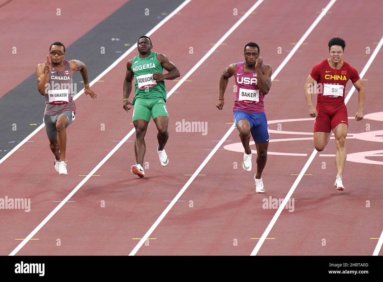 Andre De Grasse of Canada, left to right, Enoch Adegoke of Nigeria ...