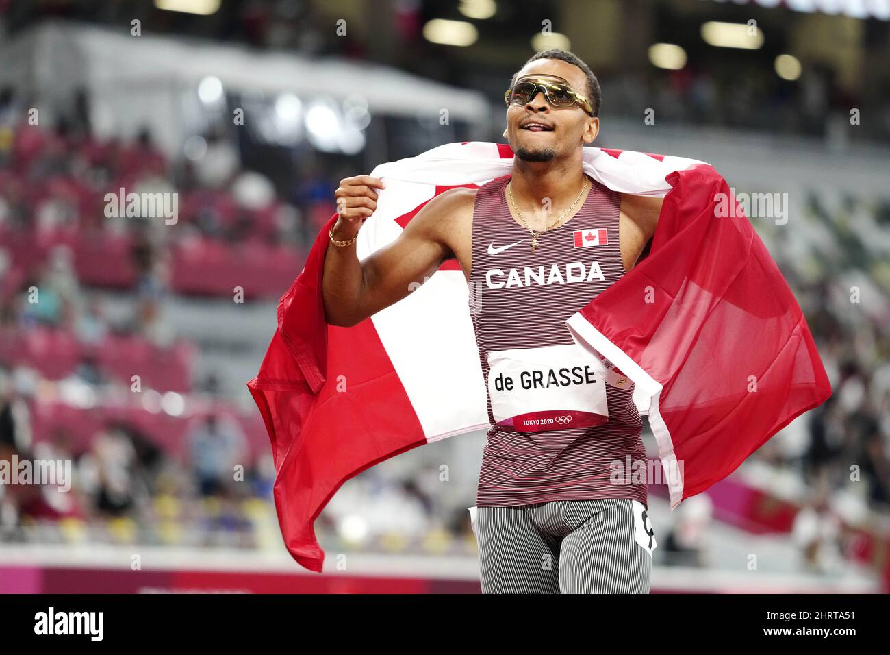 Andre De Grasse of Canada reacts after winning the bronze medal in the ...
