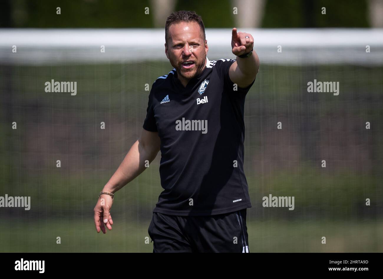 Vancouver Whitecaps head coach Marc Dos Santos gives instructions to ...