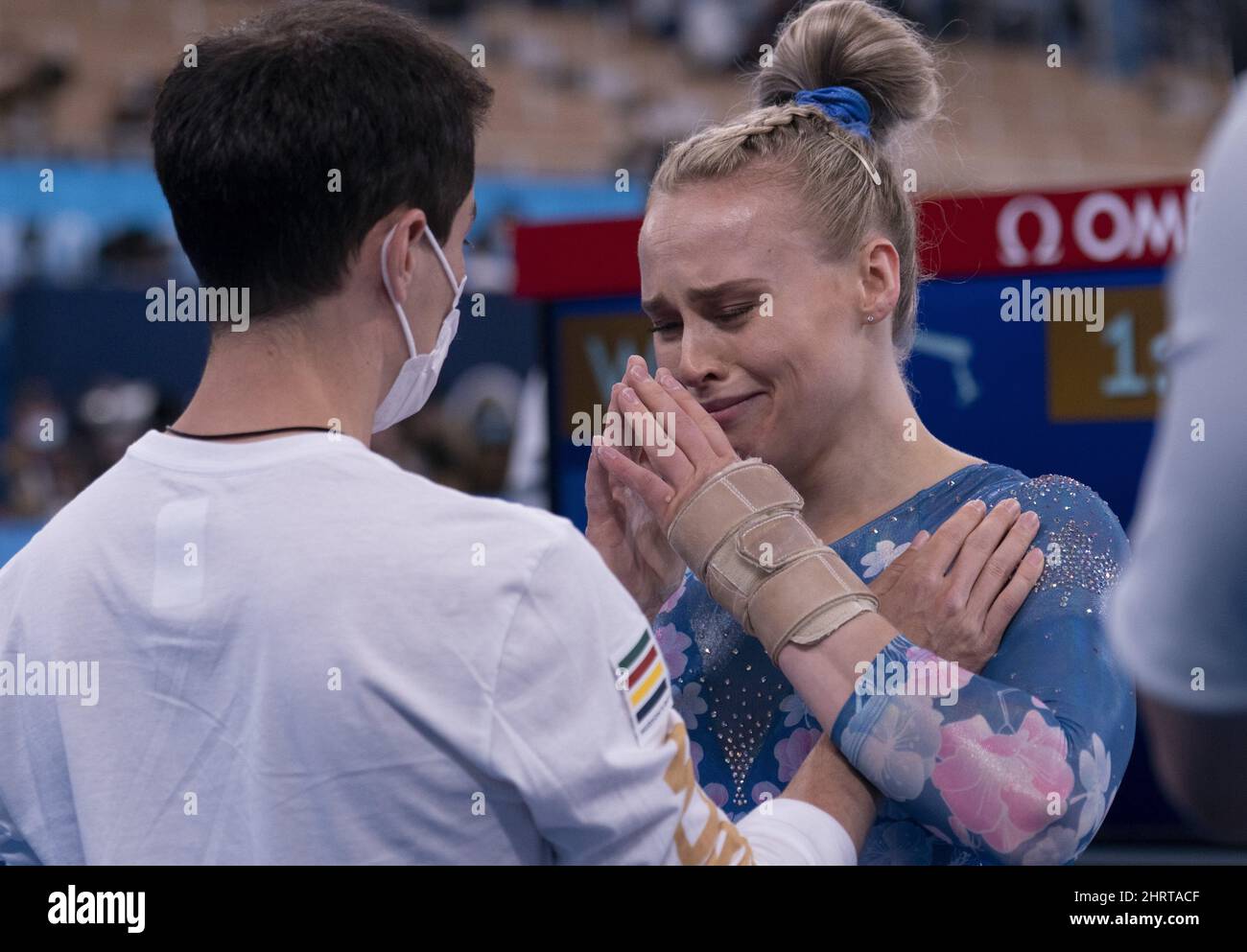 Canadian gymnast Ellie Black, from Halifax, speaks with her coach David Kikuchi after competing ...