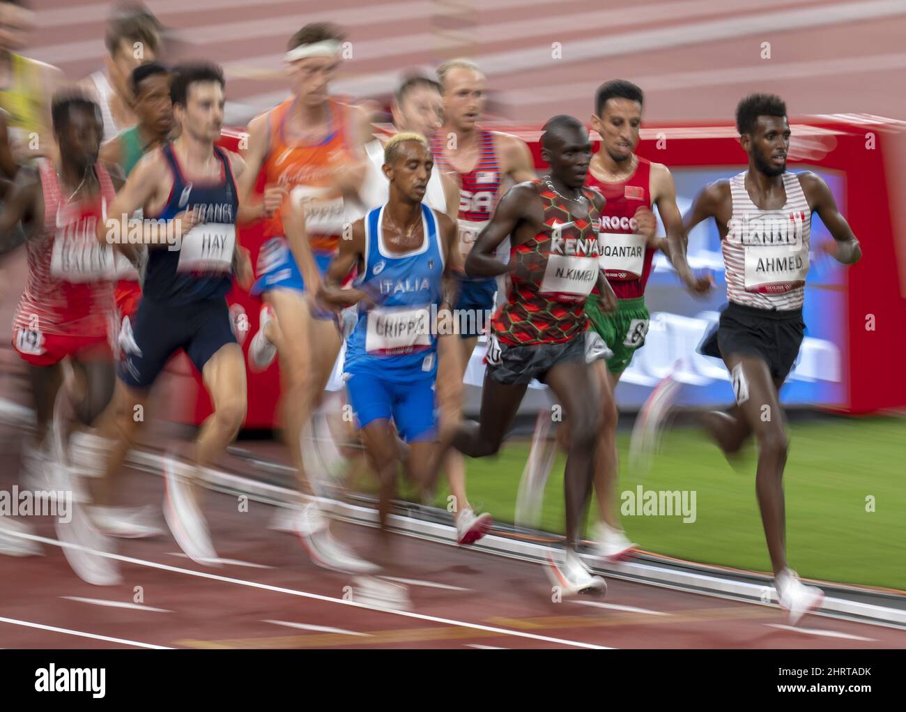 Canadaâ€™s Mohammed Ahmed (right) leads the field on his way to second ...