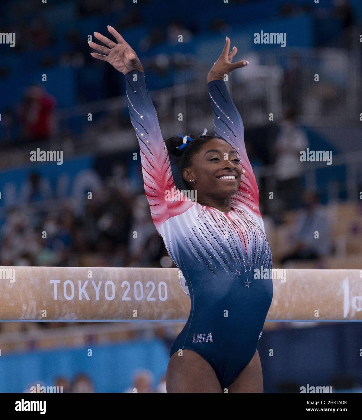 Simone Biles, from the United States, competes in the balance beam ...