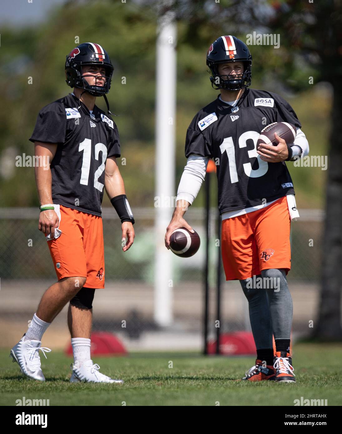 B.C. Lions quarterbacks Nathan Rourke, left, and Mike Reilly are seen ...