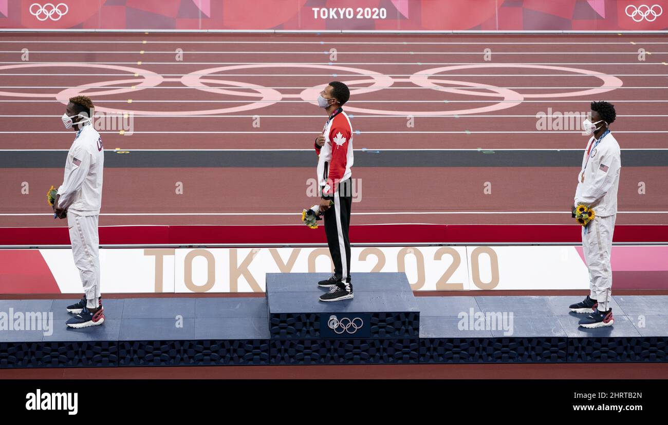 Canada‚Äôs Andre De Grasse, from Markham, Ont. stands on the podium ...