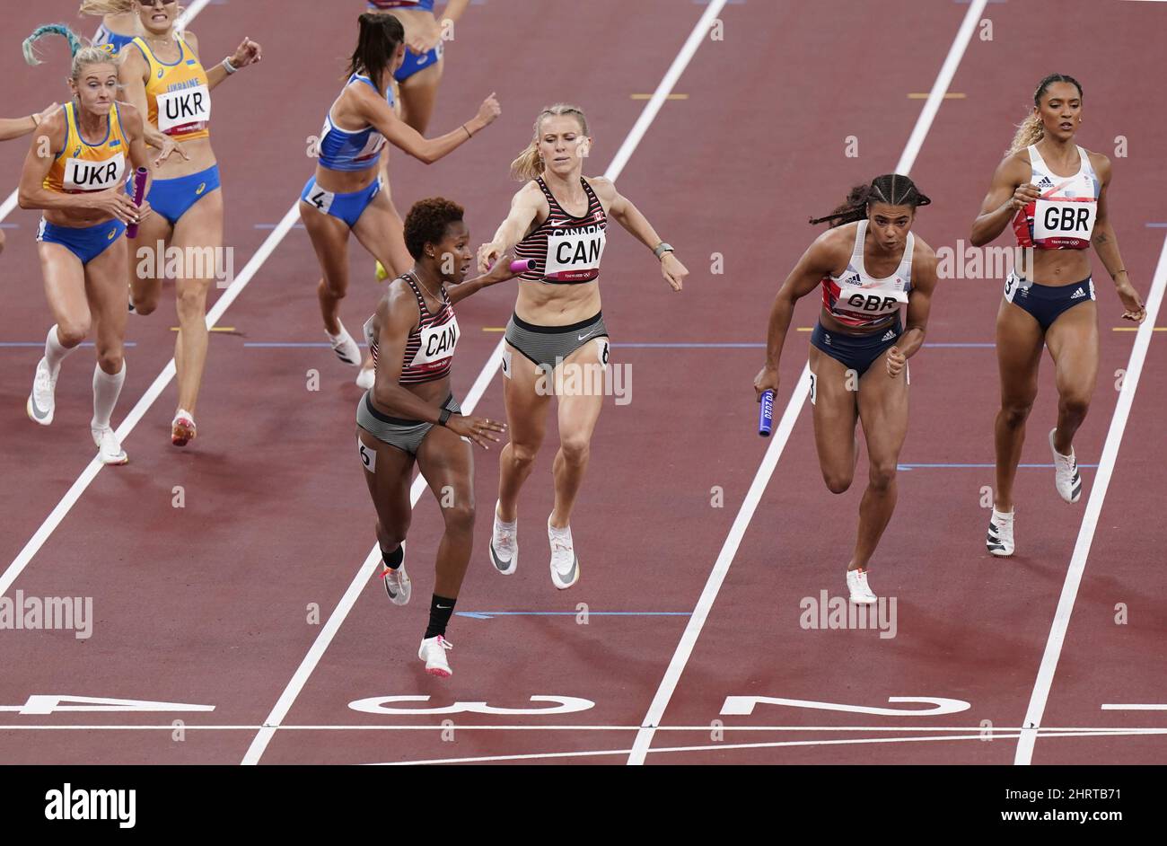 Canadaâ€™s Maddy Price hands off the baton to Kyra Constantine in the 4 ...
