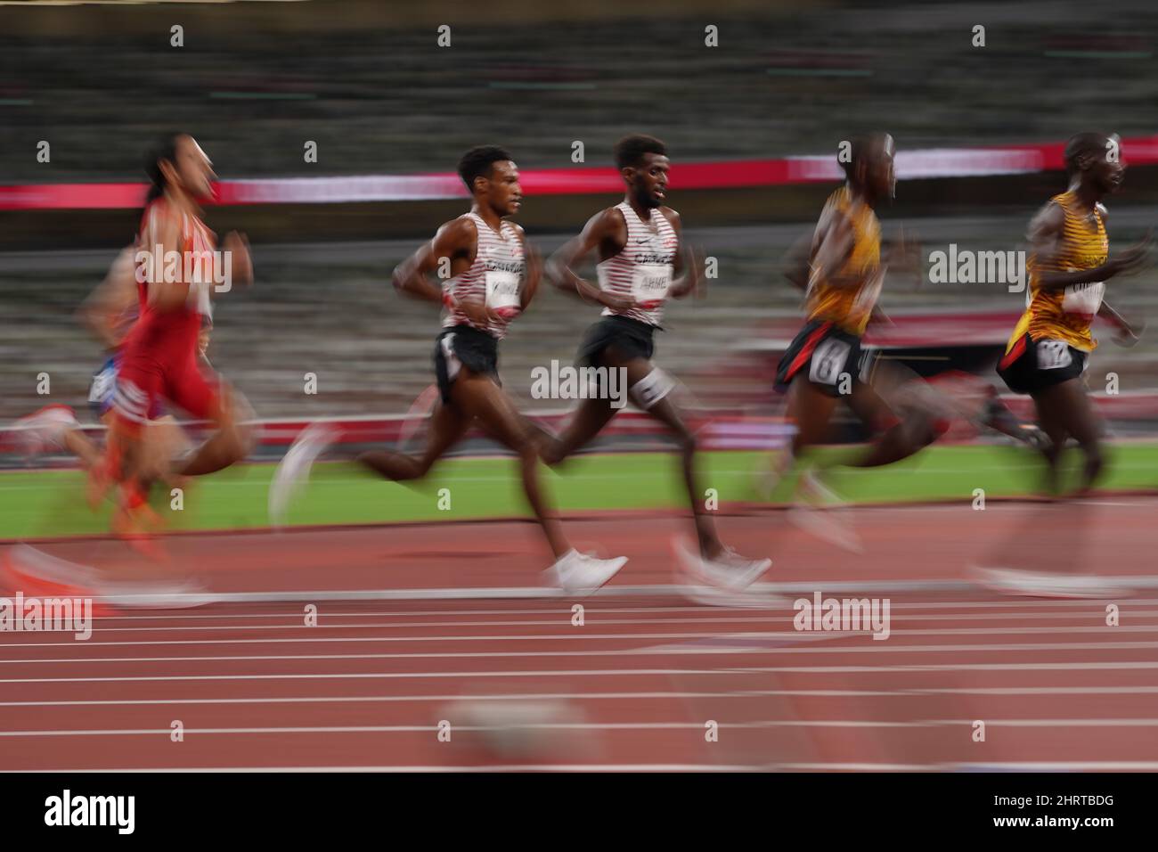 Canada's Mohammed Ahmed (centre right) and Justyn Knight (centre left) race in the men's 5000 ...