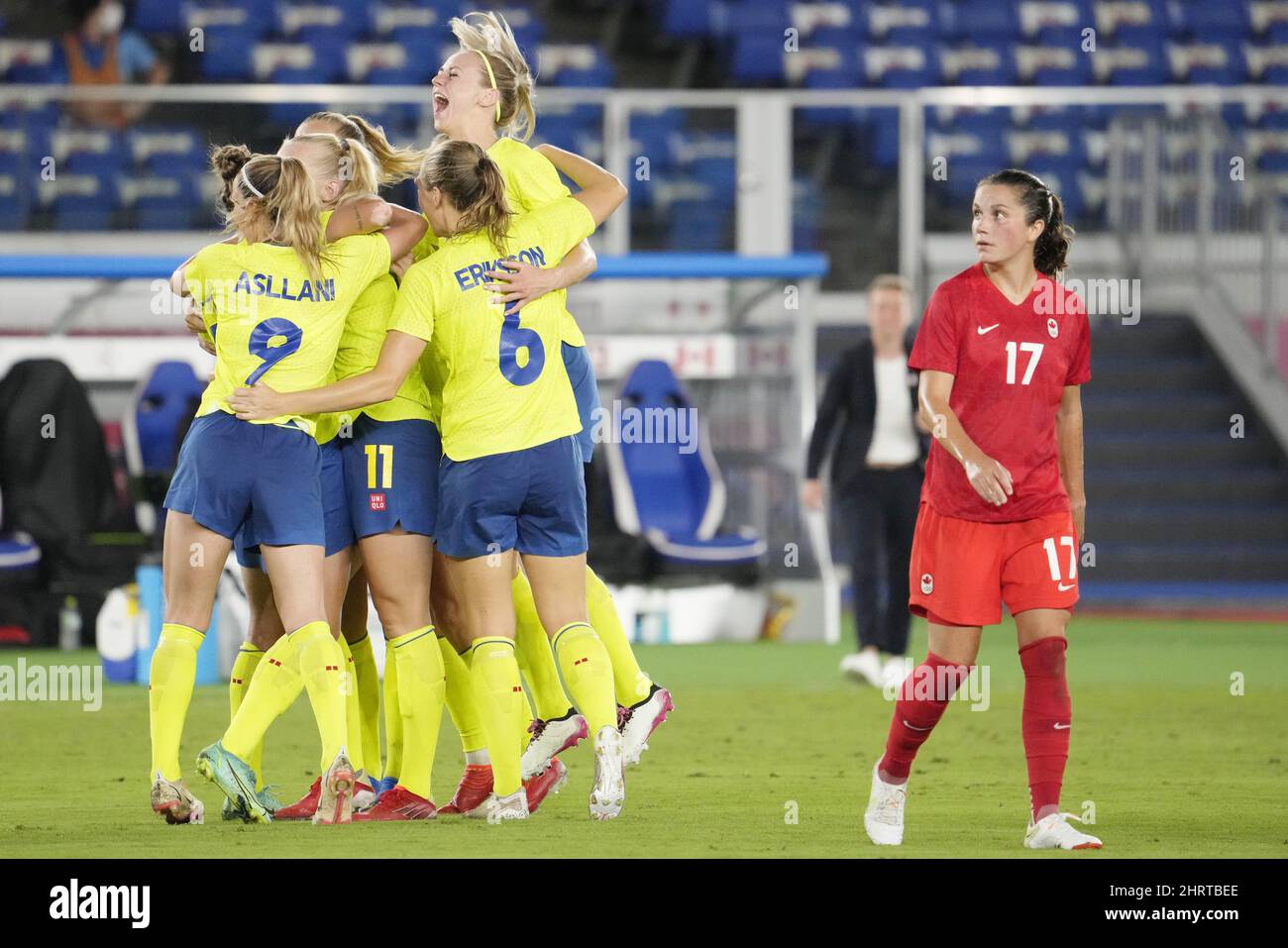 Sweden celebrates their goal as Canada's Jessie Fleming looks on in the ...