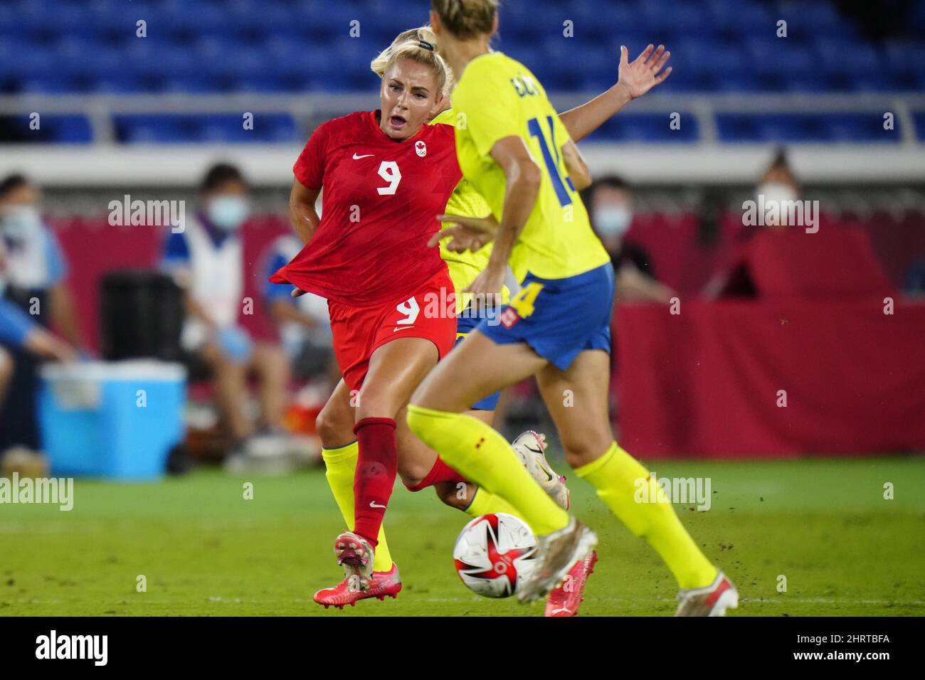 Canada's Adriana Leon is tripped in the women's soccer final against ...