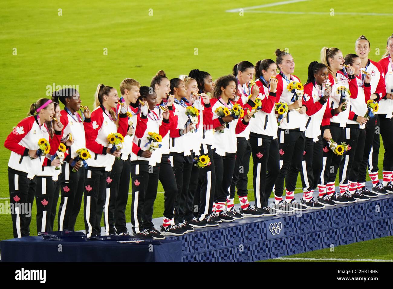 Canada celebrates with their gold medals after defeating Sweden in the ...