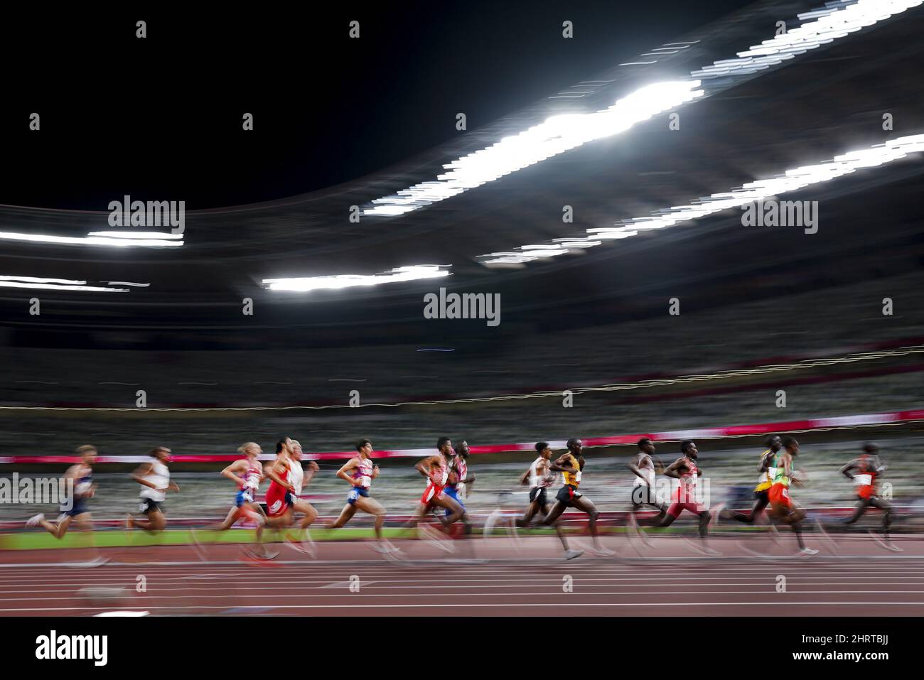 The field competes in the Men's 5000m final during the summer Tokyo ...