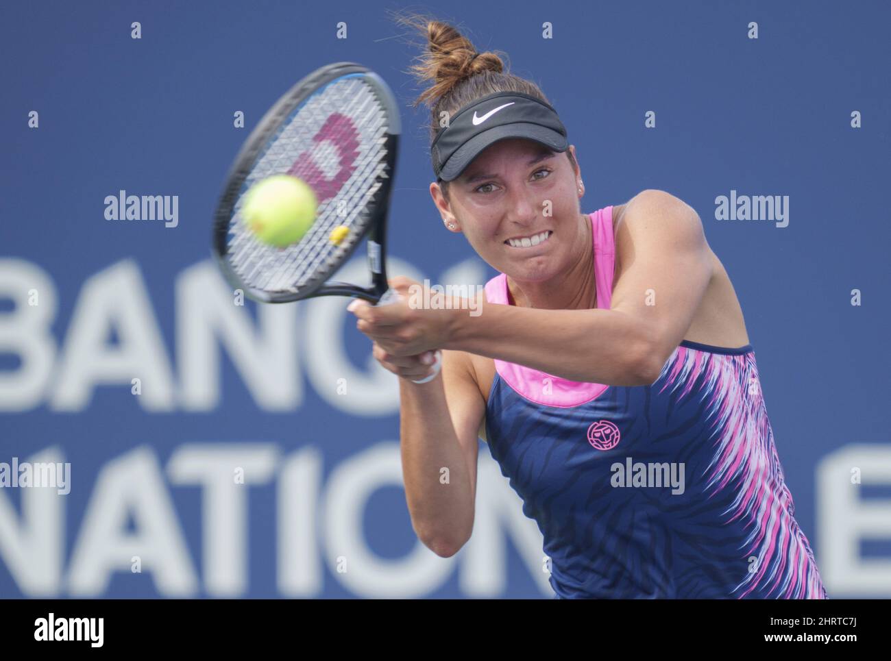 Oceane Dodin of France returns o Karolina Muchova of the Czech Republic ...