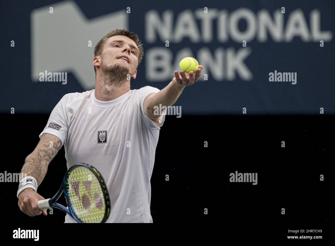 Kazakhstan's Alexander Bublik serves the ball against Russia's Daniil ...