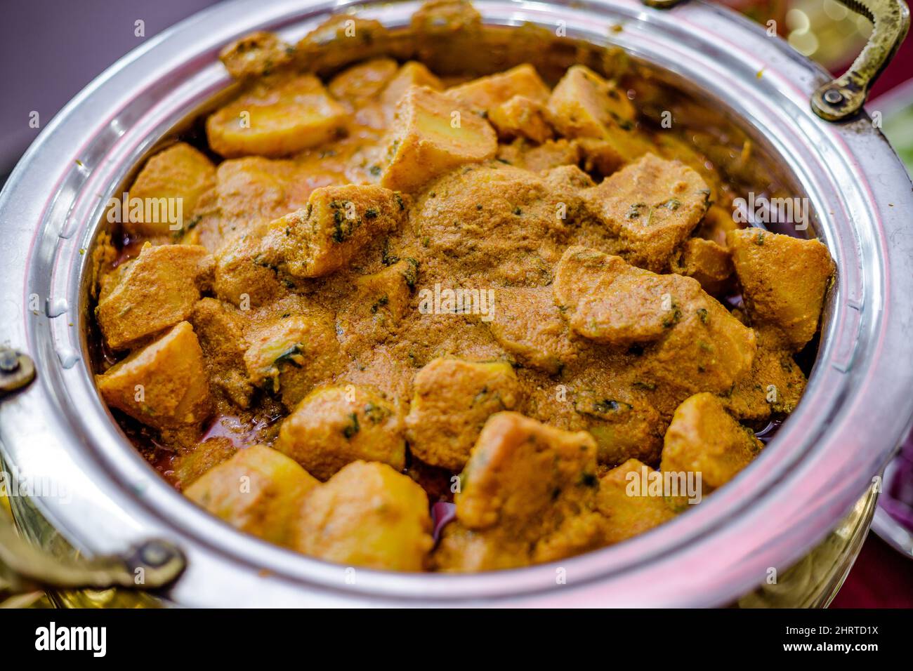 Dum Aloo spicy potato served with thick gravy Stock Photo - Alamy