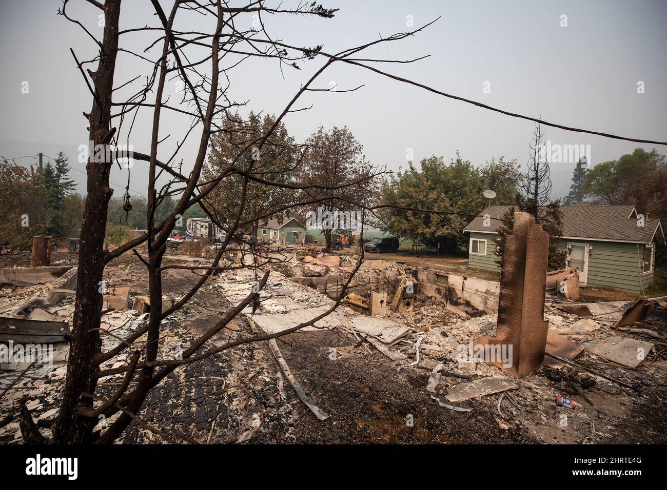 The remains of a house destroyed by the White Rock Lake wildfire is ...