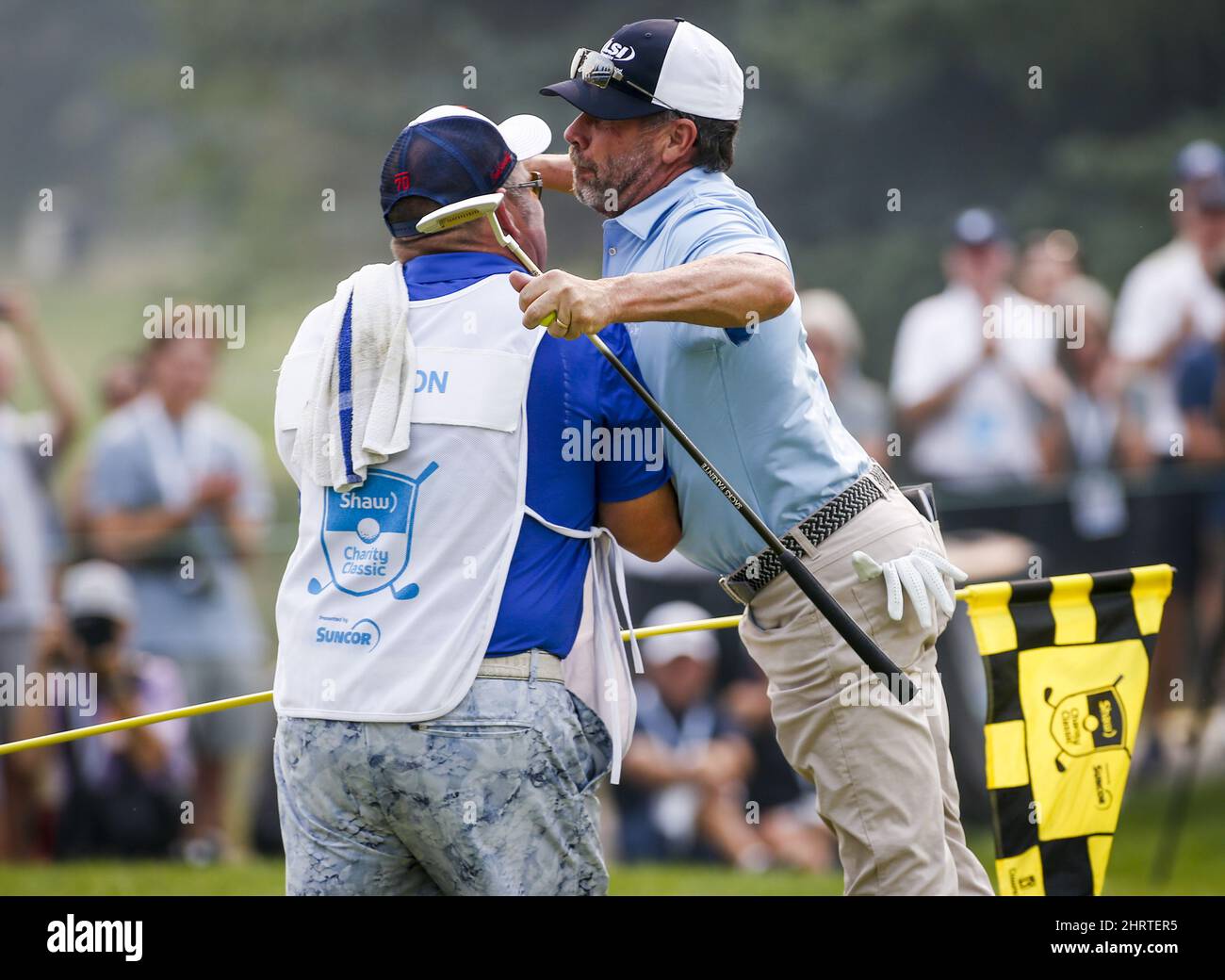 Doug Barron, right, of the United States, celebrates with his caddie ...