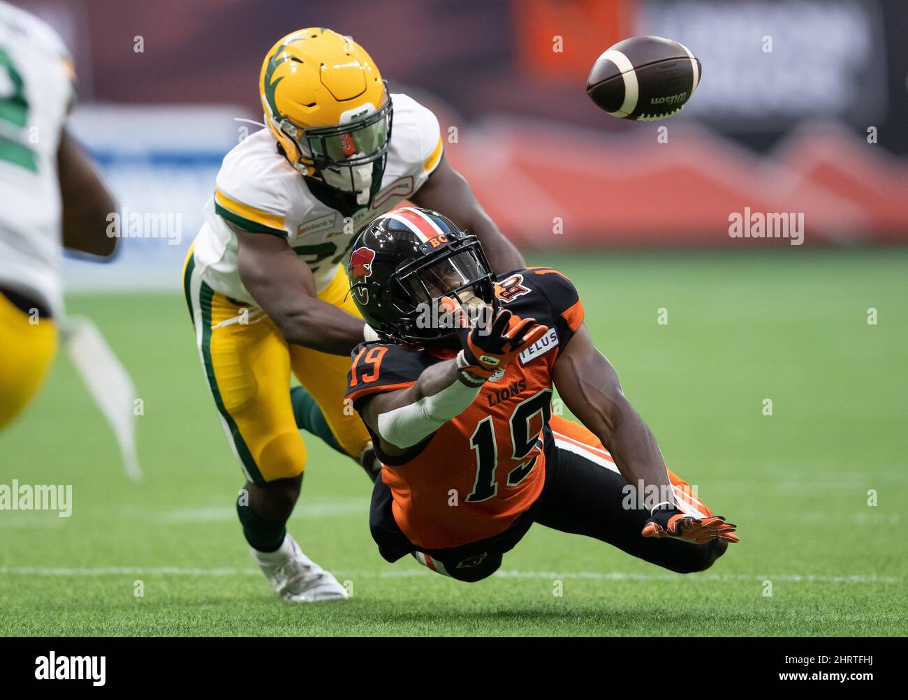 B.C. Lions' Dominique Rhymes (19) dives but fails to make the reception ...