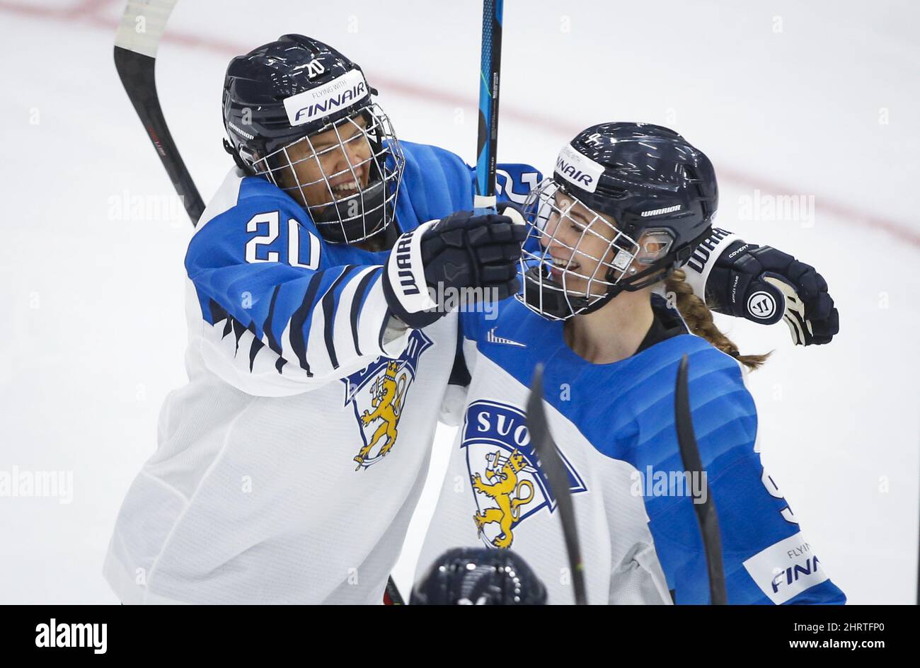 Finland's Nelli Laitinen, right, celebrates her goal with teammate ...
