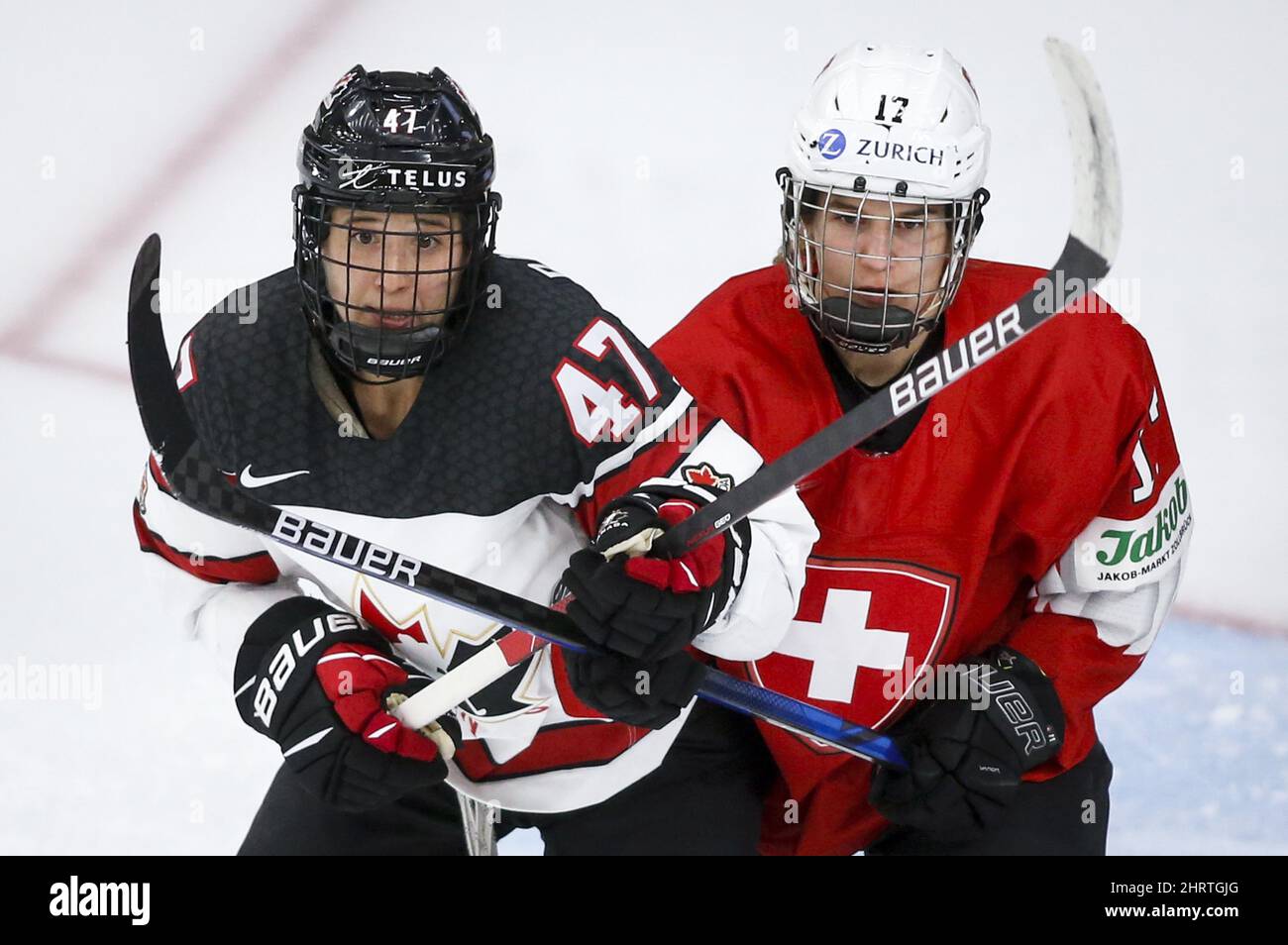 Switzerland's Lara Christen, right, and Canada's Jamie Rattray struggle ...