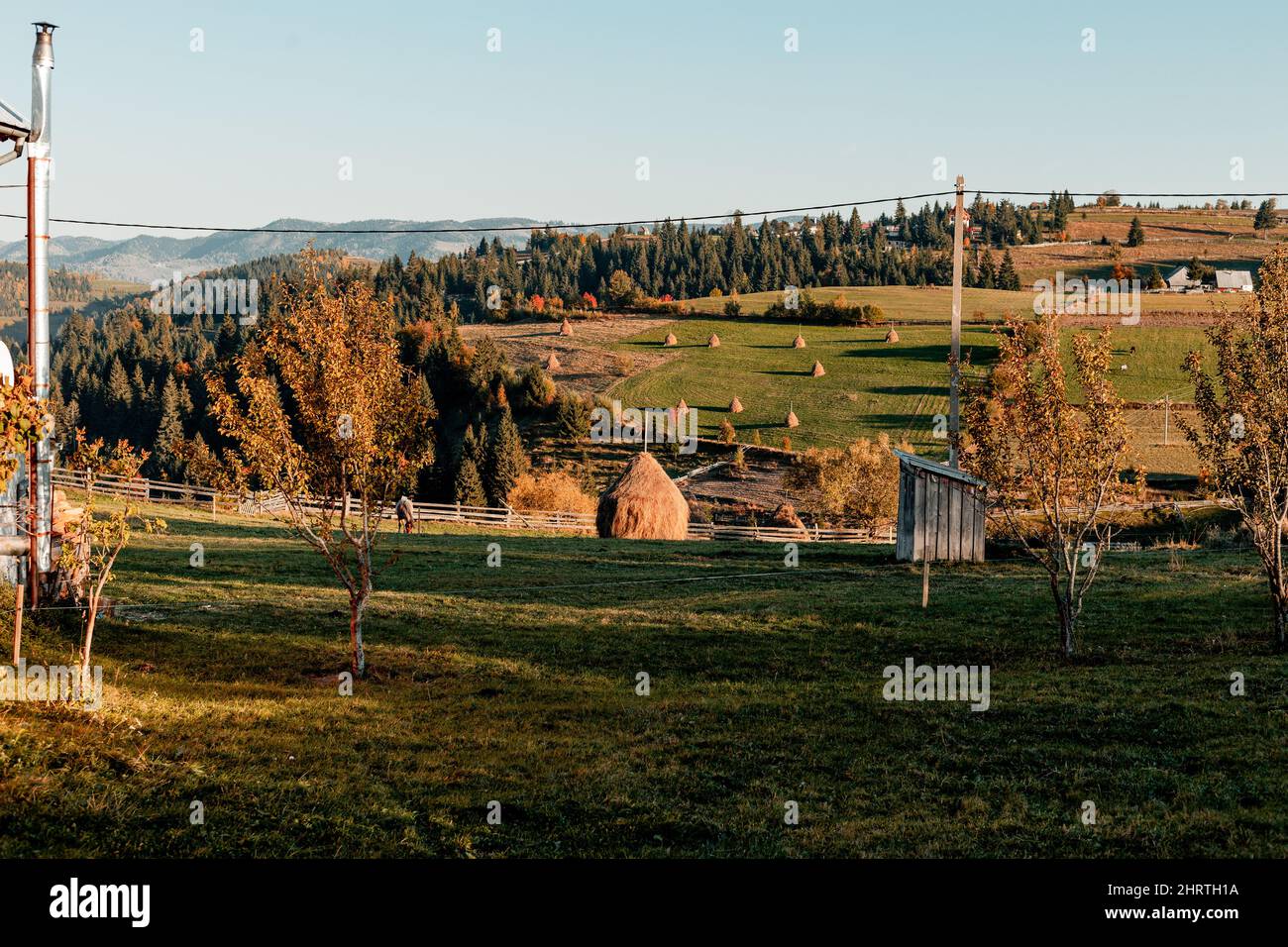 Village view with haystacks hi-res stock photography and images - Alamy