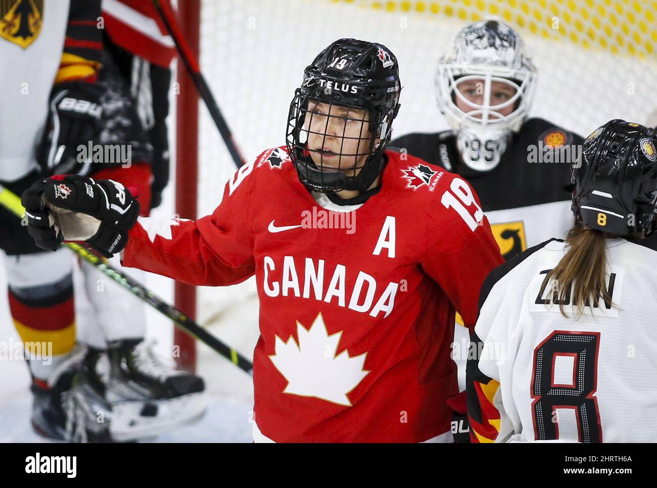 Canada's Brianne Jenner, left, celebrates her goal as Germany goalie ...