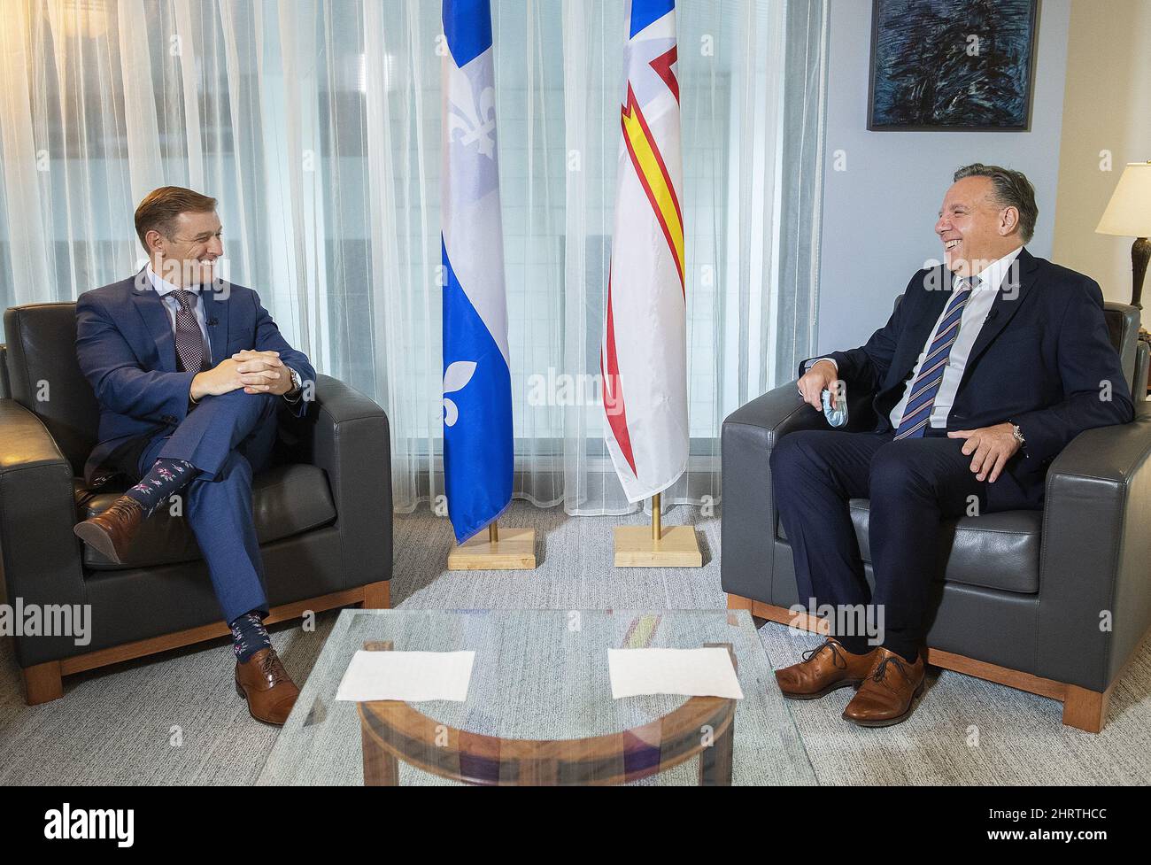 Quebec Premier Francois Legault, right, speaks with Newfoundland and ...