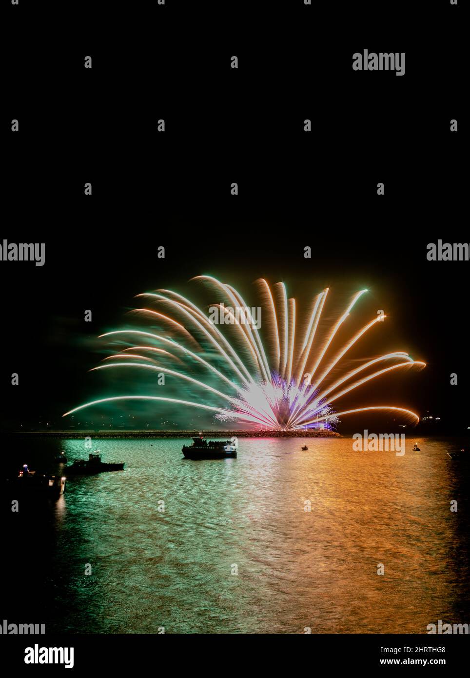 View of huge colorful British firework championships over the harbor in ...