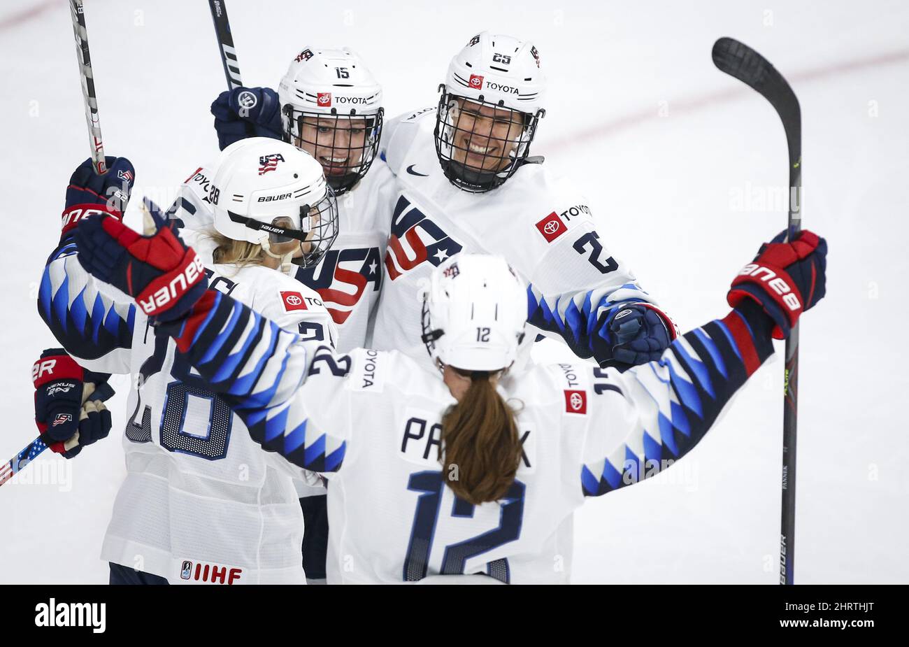 Alex Carpenter, top right, of the United States, celebrates her goal ...