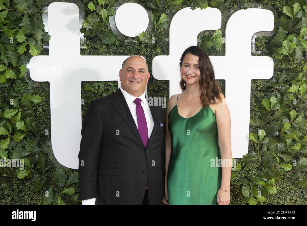 Producers Tara Woodbury (right) and Paul Barkin walk the red carpet to ...