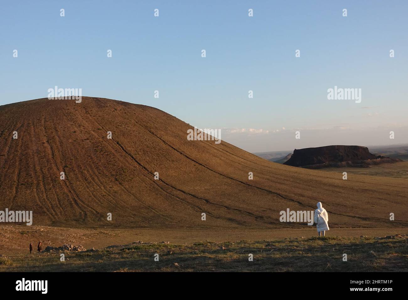 Volcano and human walk on it Stock Photo - Alamy