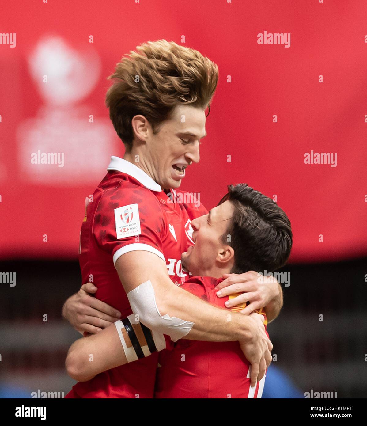 Canada's Brennig Prevost, left, and Andrew Coe celebrate Prevost's try ...