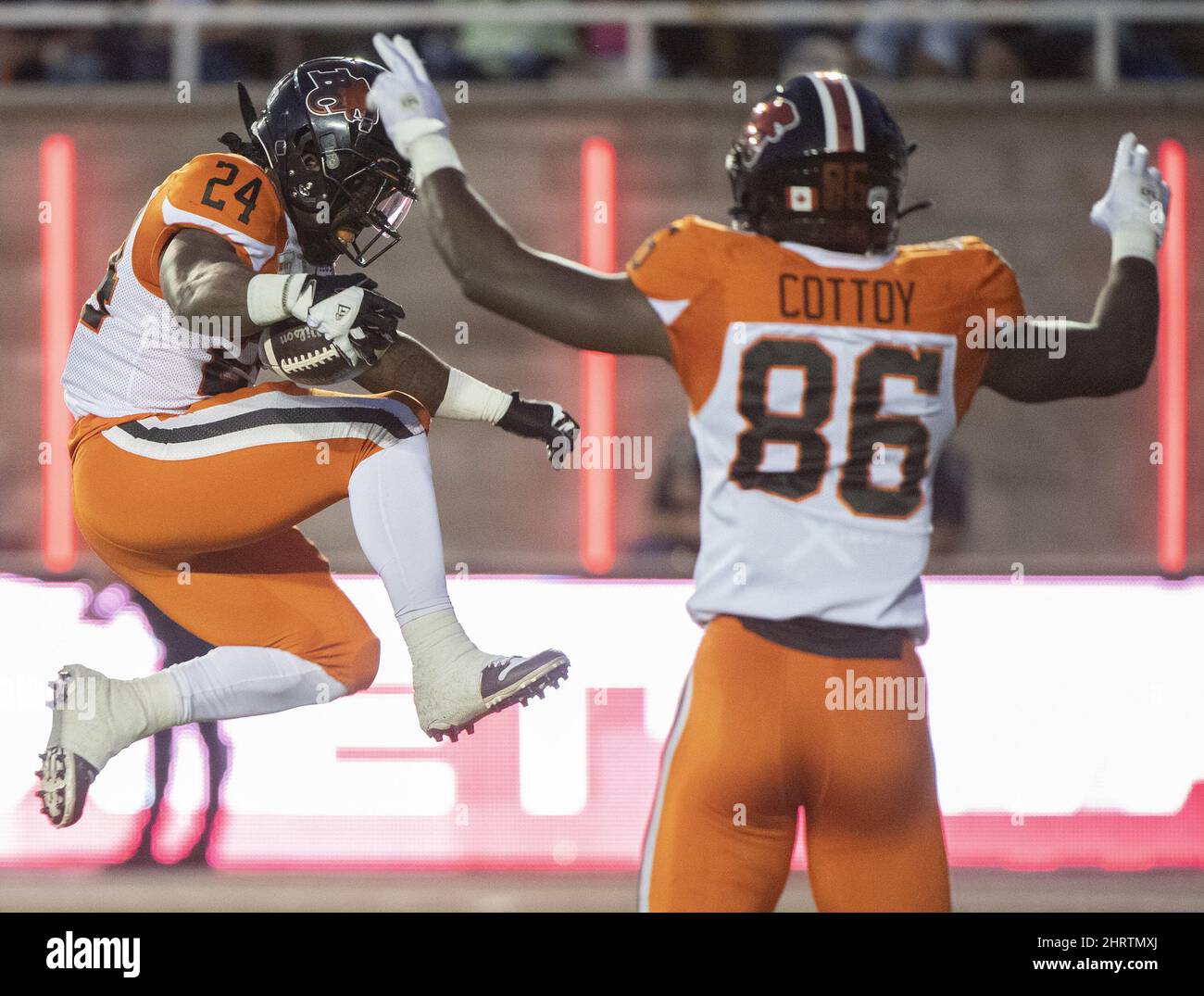 B.C. Lions James Butler (24) runs in for a touchdown during first half ...