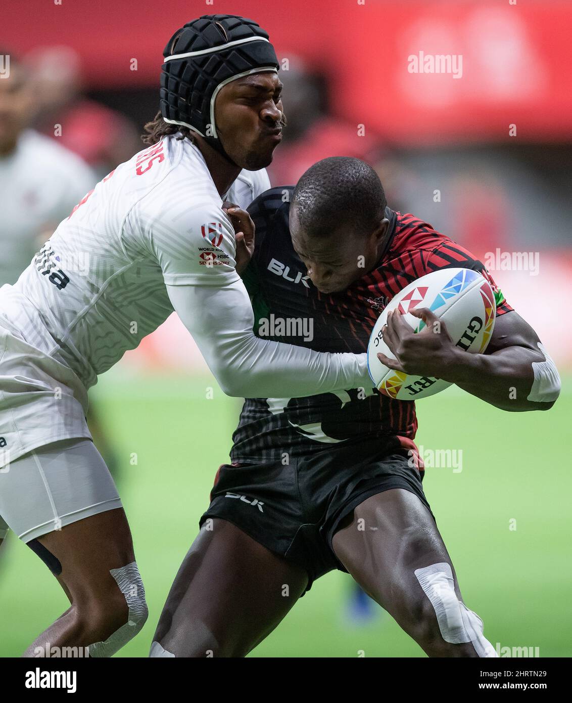 United States' Kevon Williams, left, tackles Kenya's Daniel Taabu ...