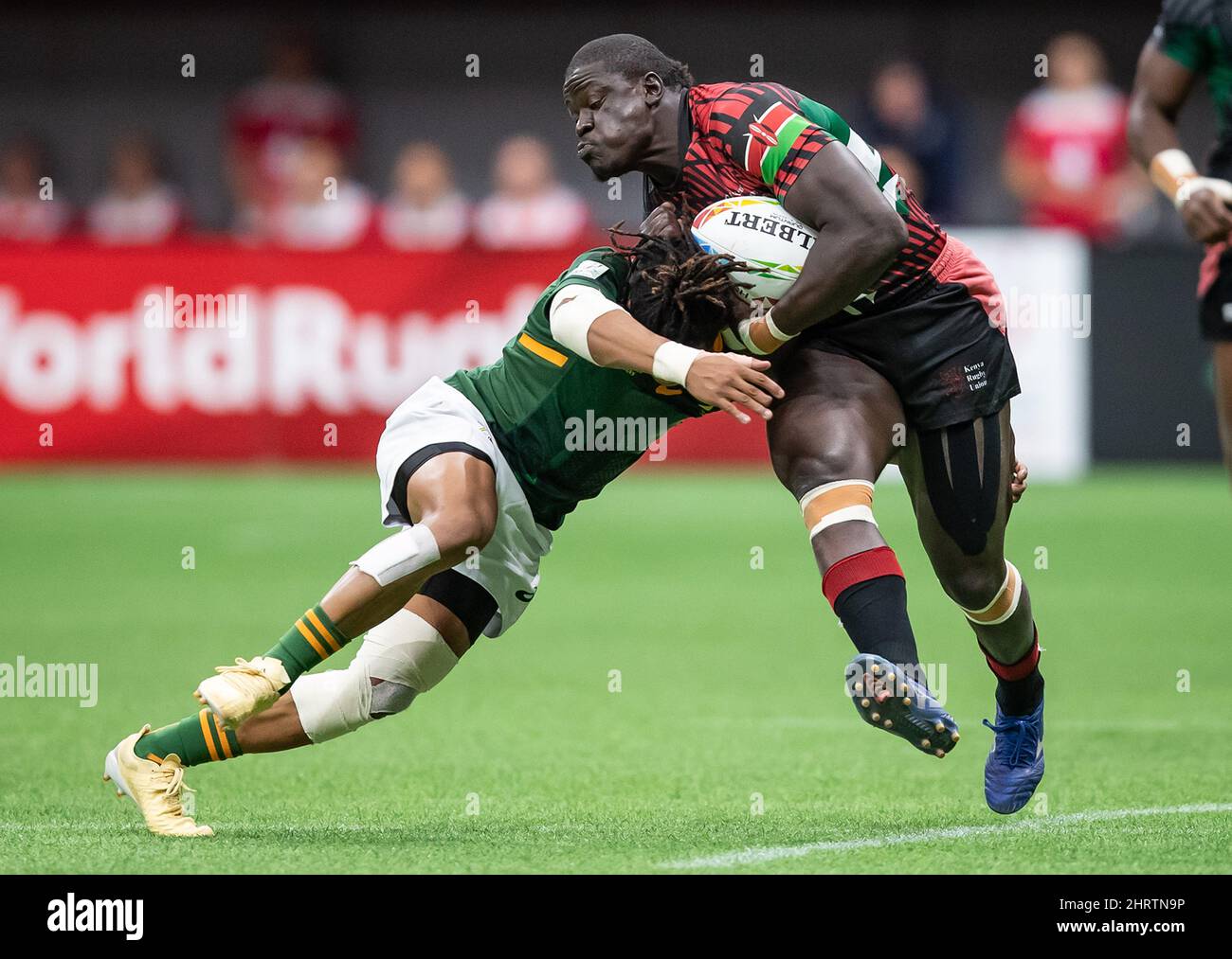 Kenya's Alvin Otieno, right, is tackled by South Africa's Dewald Human ...