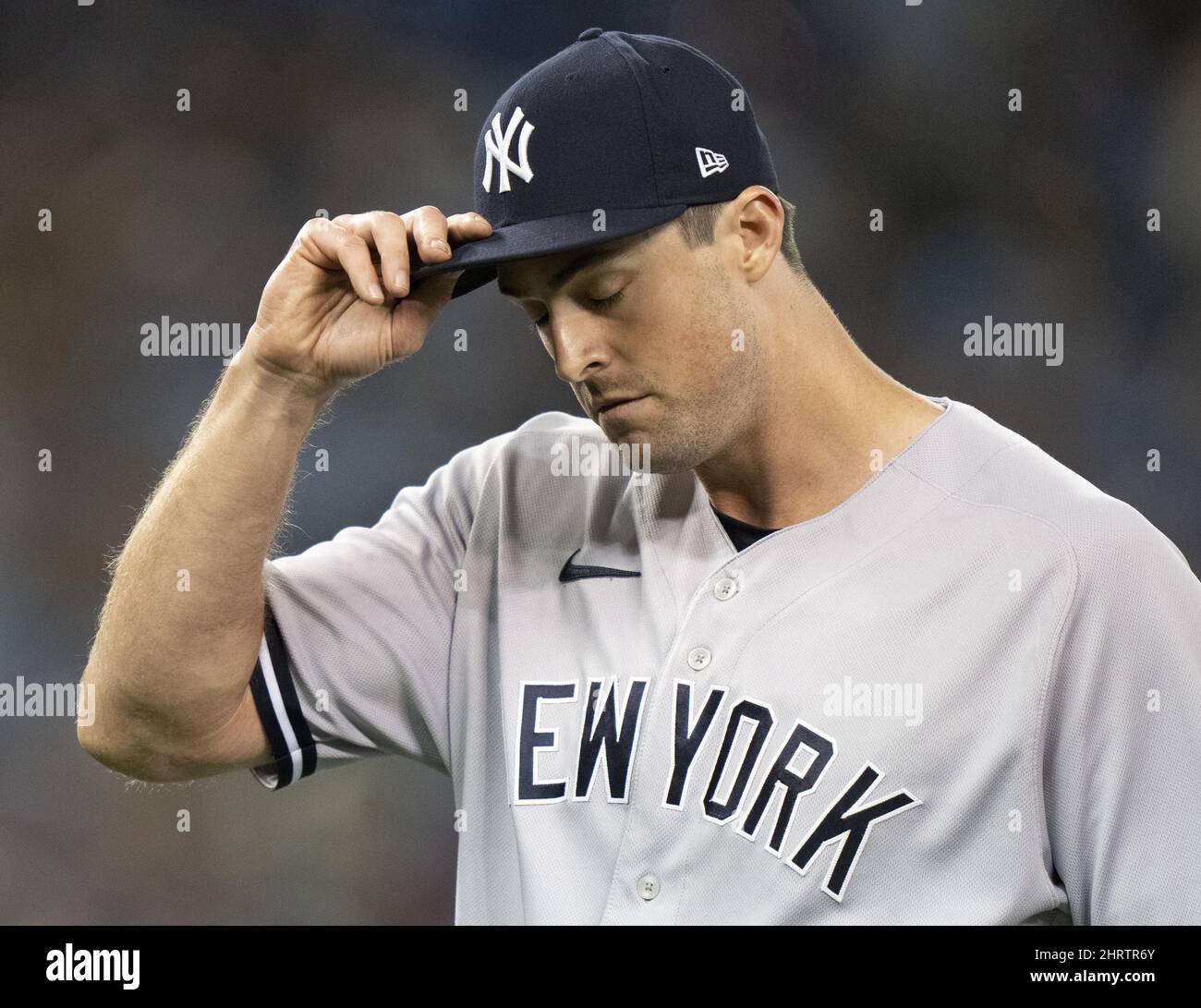 New York Yankees relief pitcher Clay Holmes (35) reacts as he walks off ...