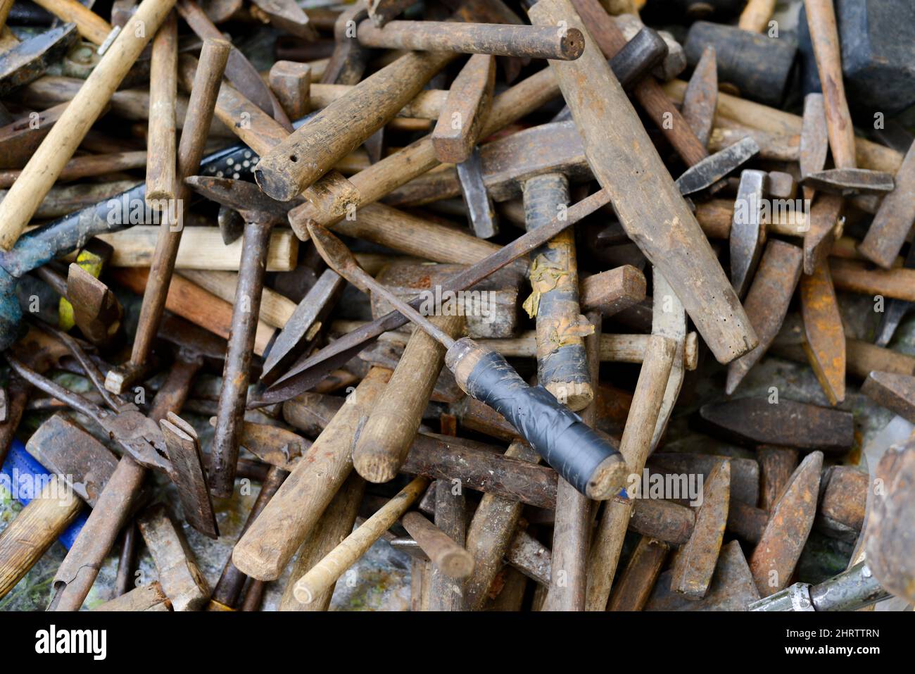 Top view of the pile of different types of wooden tools on each other ...
