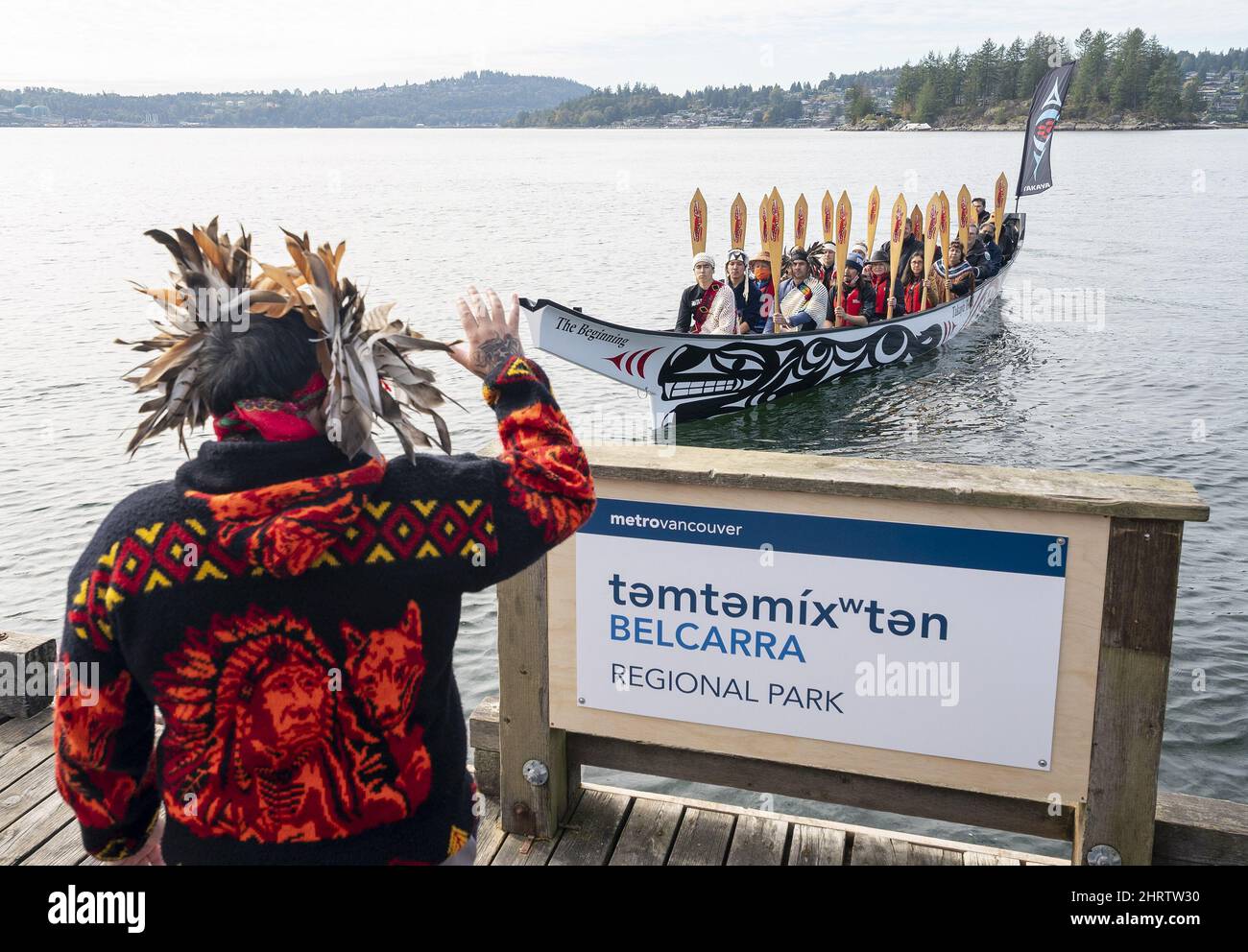 Paddlers from the Tsleil-Waututh Nation are greeted as they arrive by ...