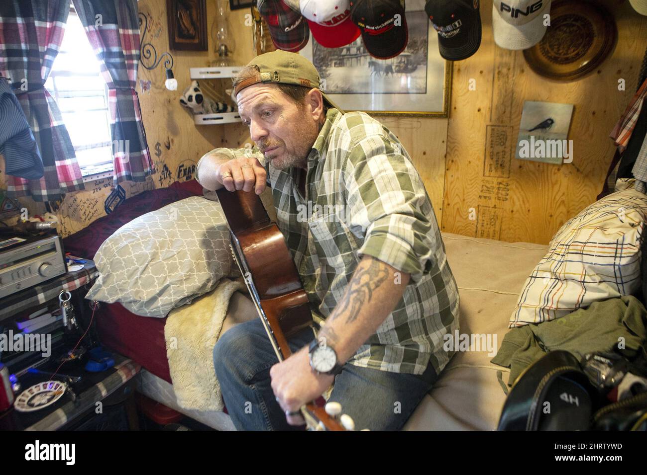 Richard (Rick) King is pictured in his home in the "A Better Tent City ...