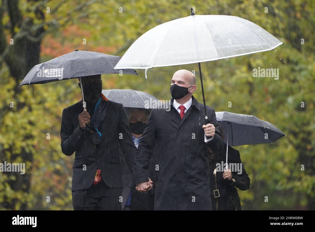 Randy Boissonnault (right) arrives for the cabinet swearing-in ceremony ...