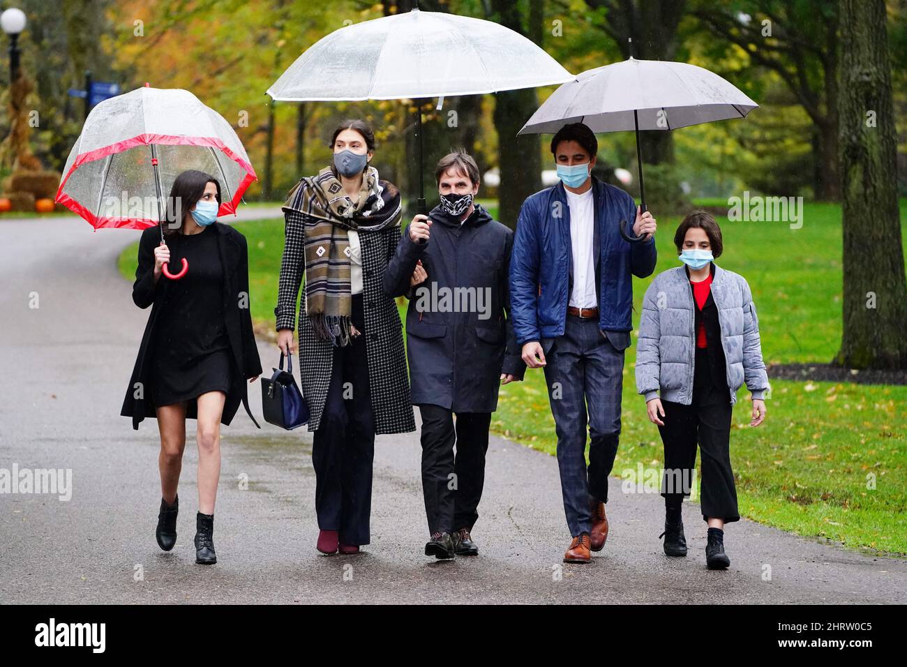 Steven Guilbeault, centre, and family members arrive for the cabinet ...
