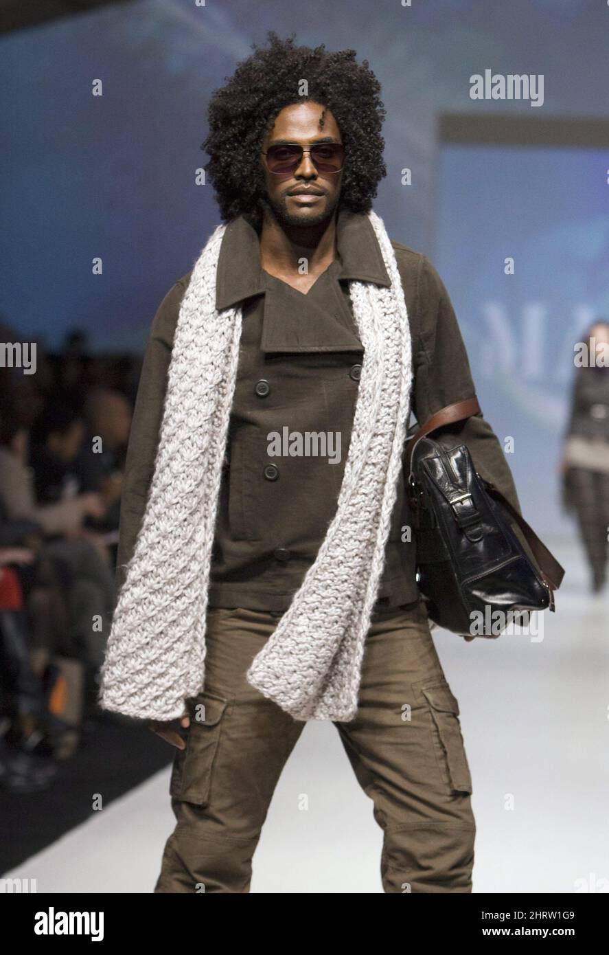 A model wears an outfit on the runway during the Mango show, part of ...