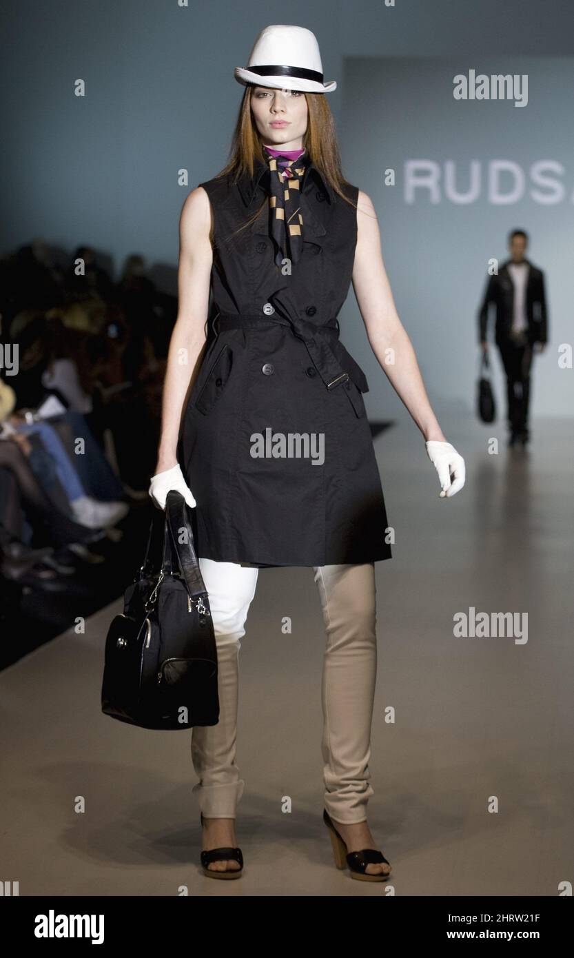 A model wears an outfit on the runway in the "Rudsak" show, part of ...