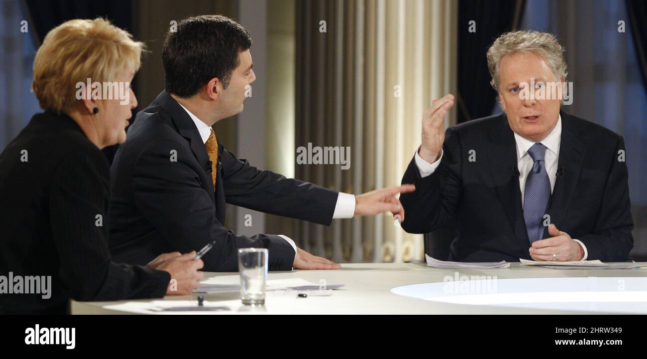 PQ Leader Pauline Marois listens as ADQ Leader Mario Dumont and Liberal ...