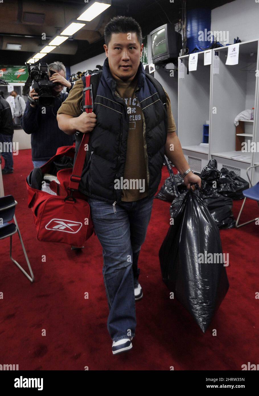 Montreal Alouettes' Bryan Chiu clears out his locker at the Olympic ...
