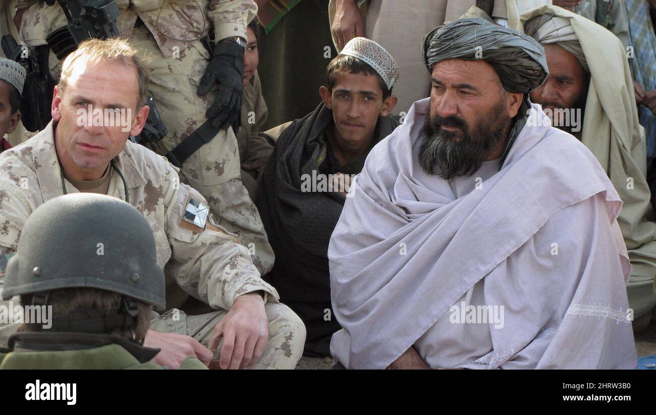Canadian Gen. Denis Thompson (left) meets with district leader Haji ...