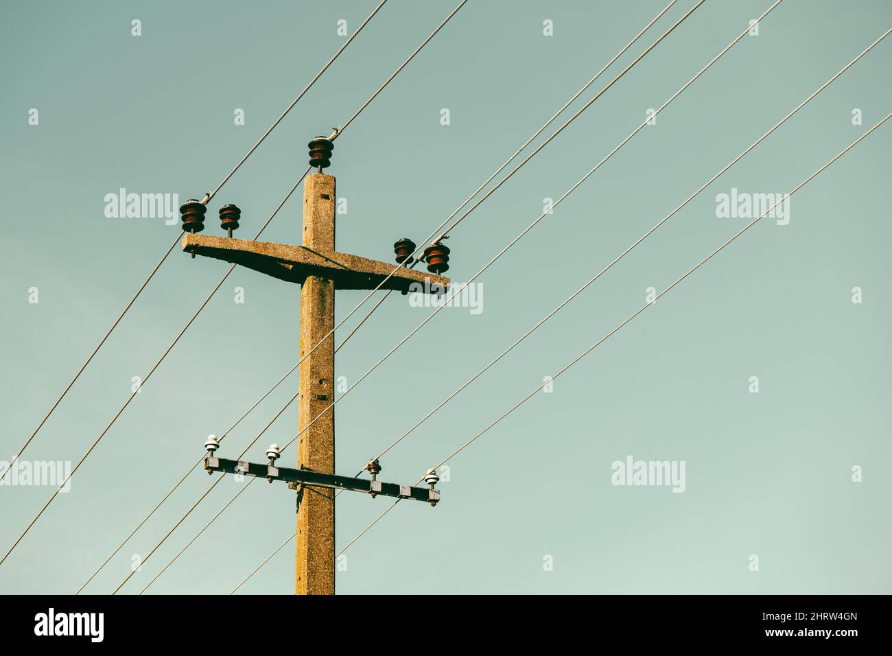 Close-up shot of old power line on sky background Stock Photo - Alamy