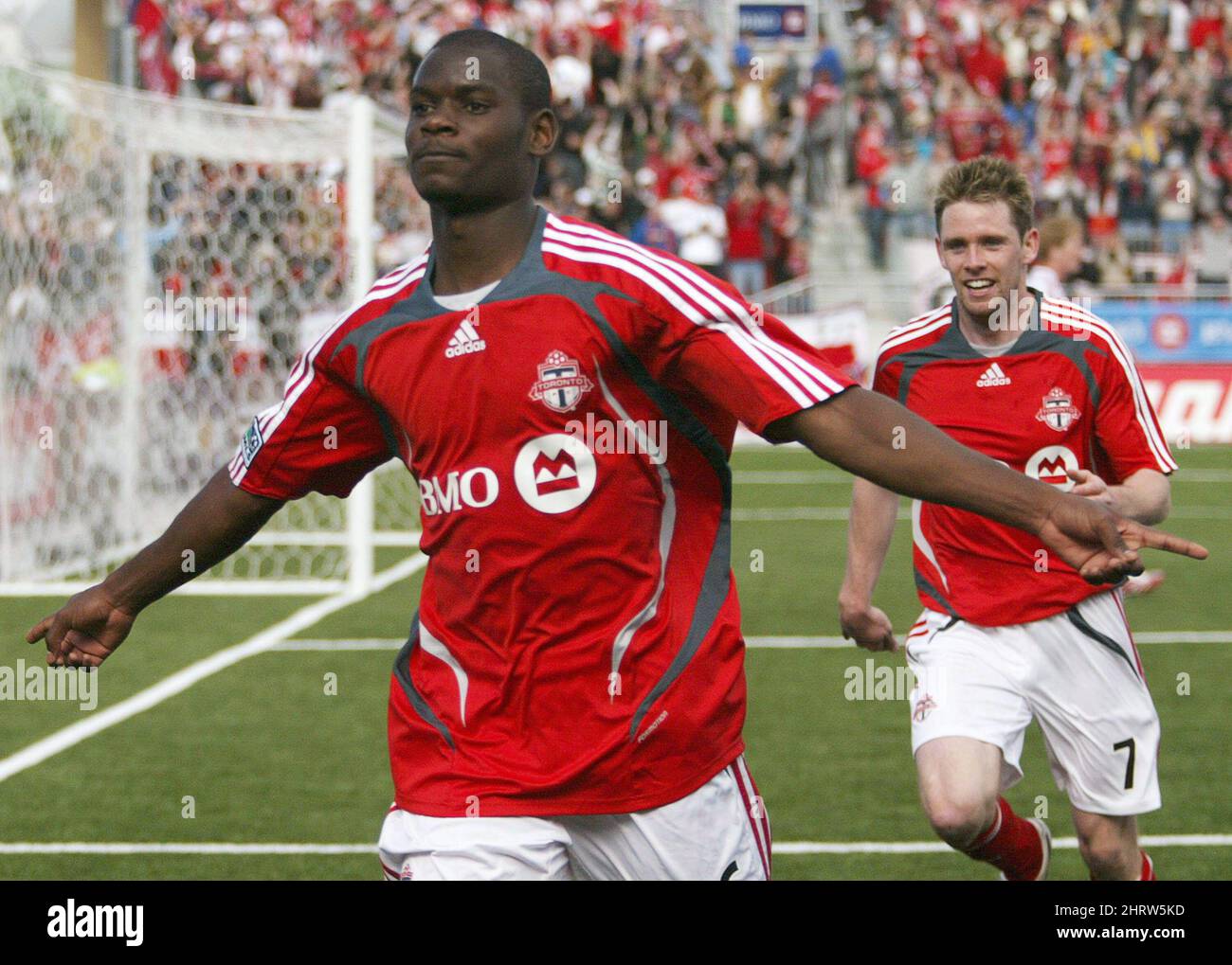 FILE-- Toronto FC's Maurice Edu is chased by Andy Welsh as he ...