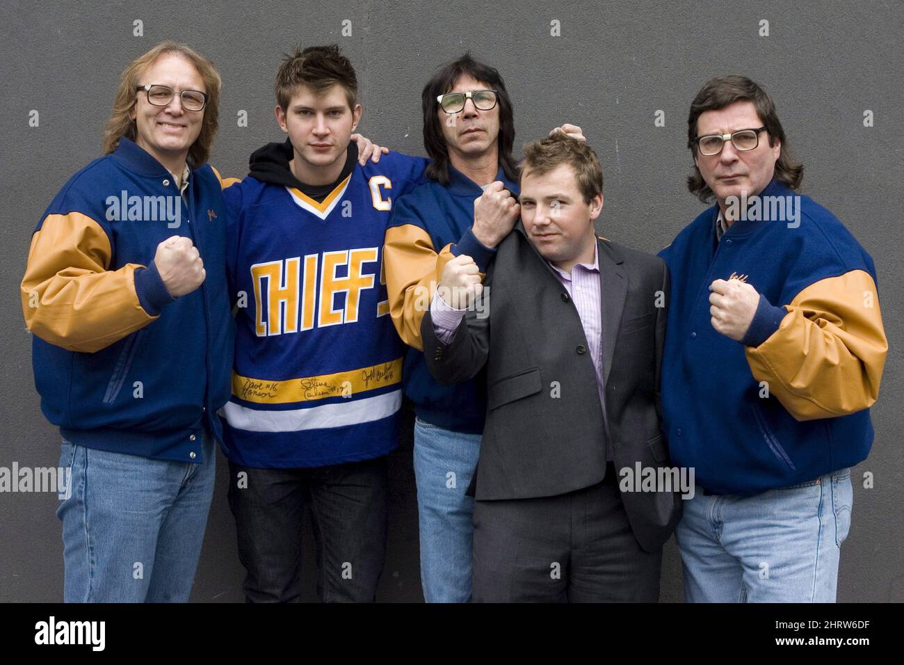 Reporter Chris Johnston (centre right) of The Canadian Press, poses for ...