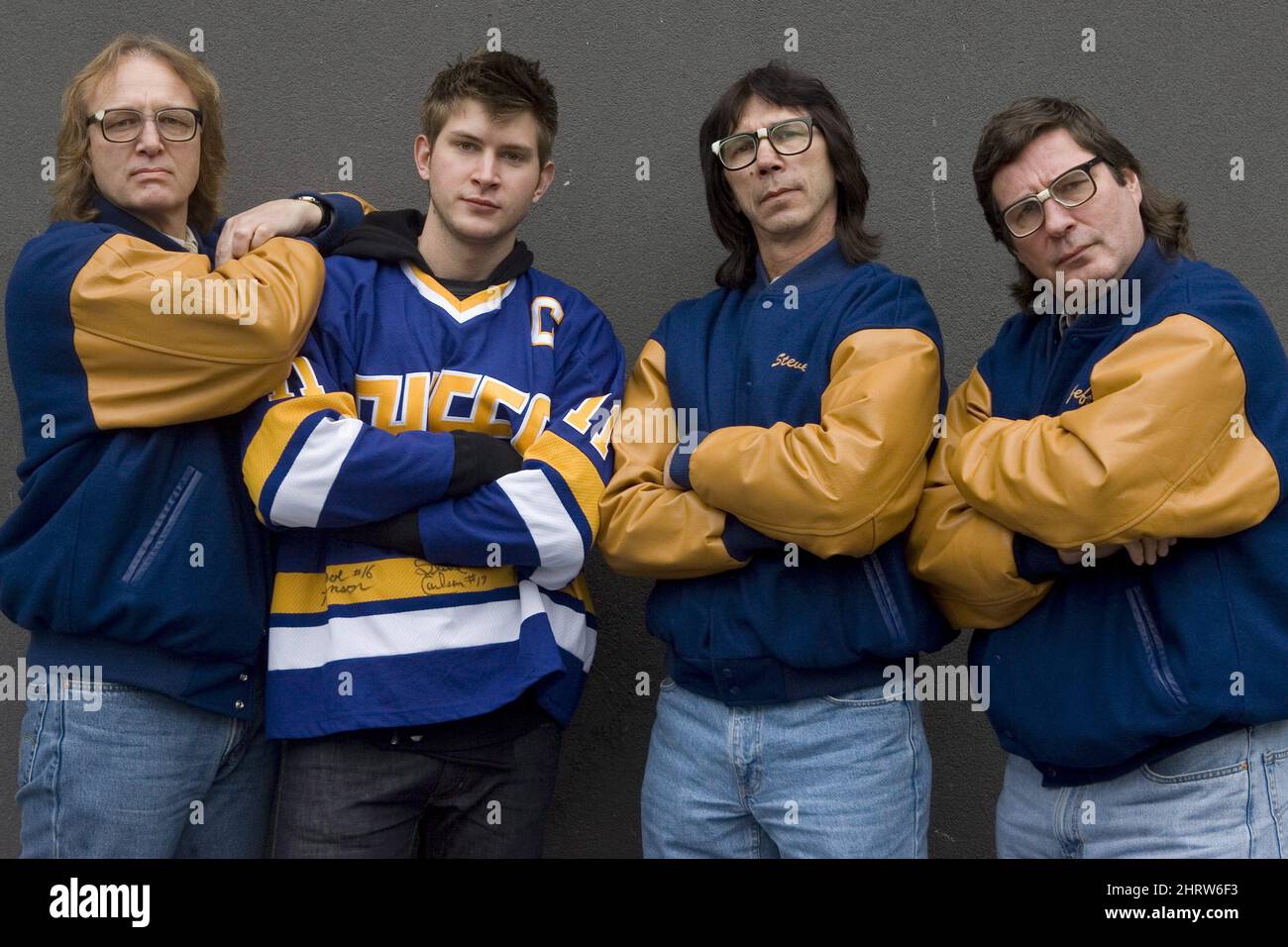 The stars of the movie "Slapshot 3," Grayston Holt (centre left) and ...