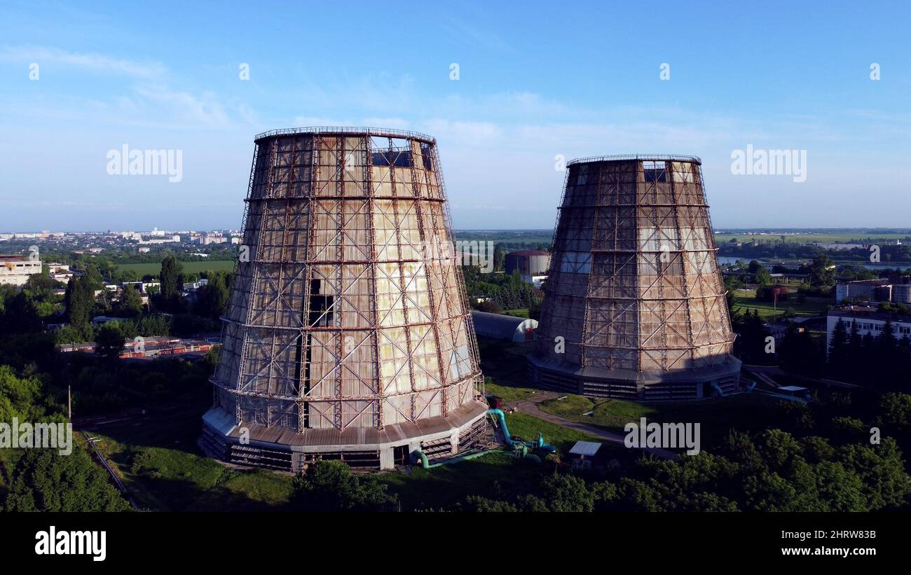 Aerial drone view flight near thermal power plant. Cooling towers of ...